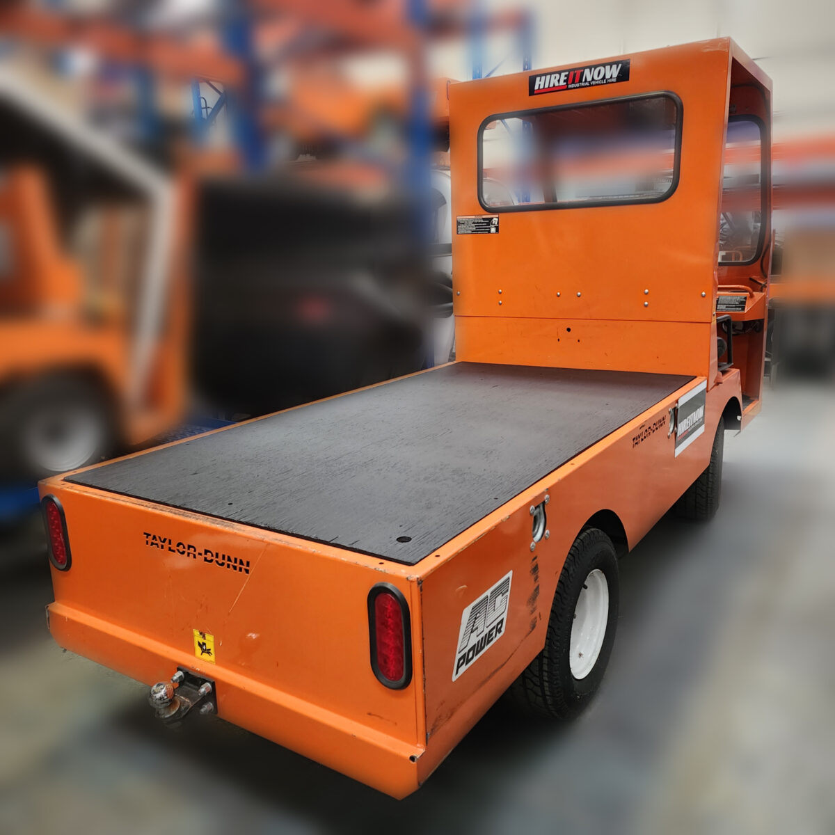 2 Seater Taylor Dunn Bigfoot with Cabin – Hire It Now